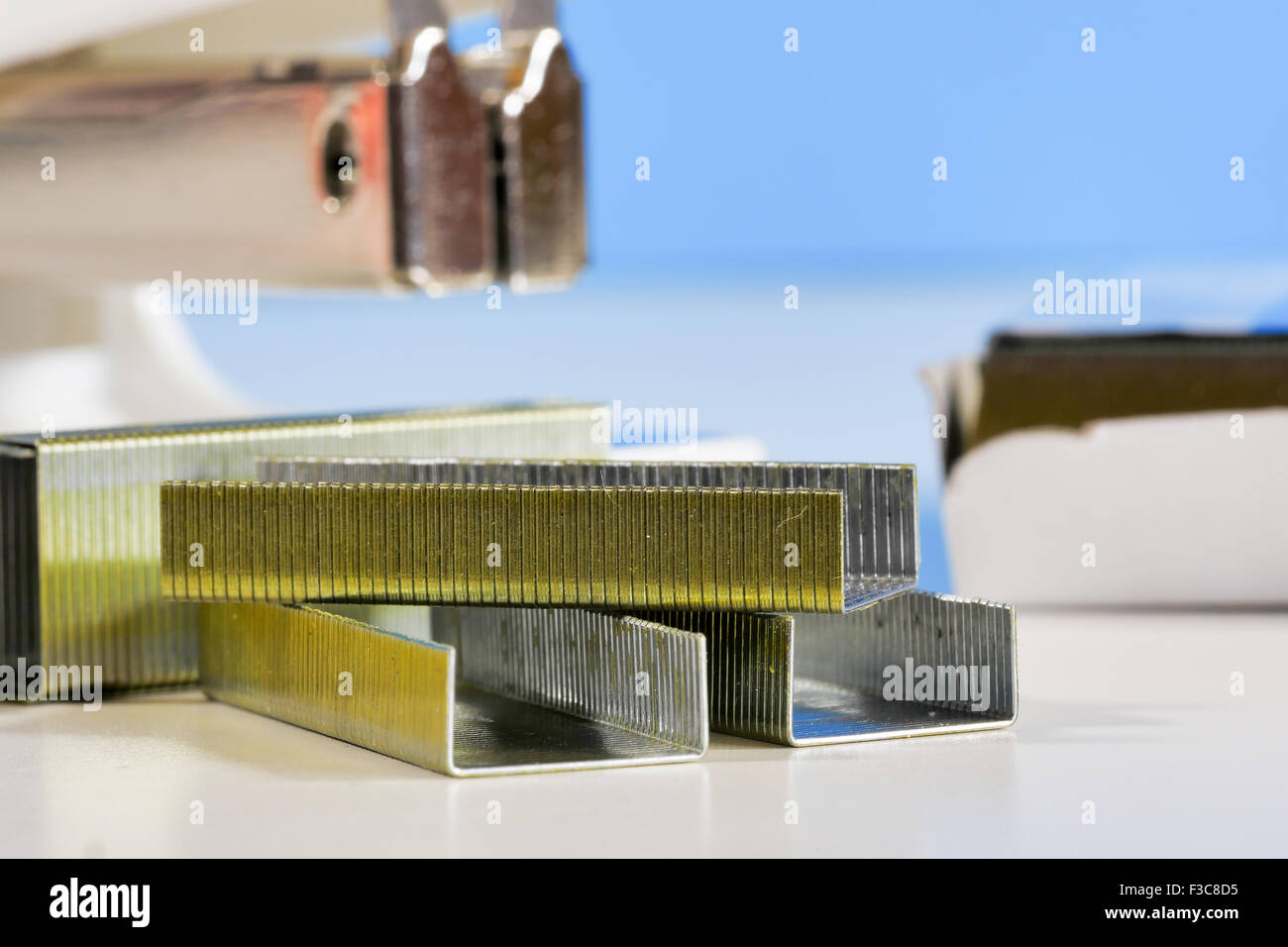 a close-up stapler with staples Stock Photo - Alamy
