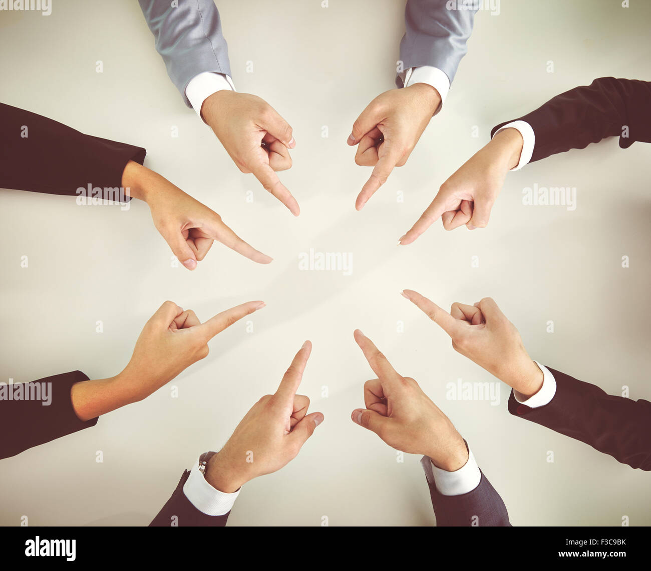 Hands of business people pointing at each other Stock Photo - Alamy