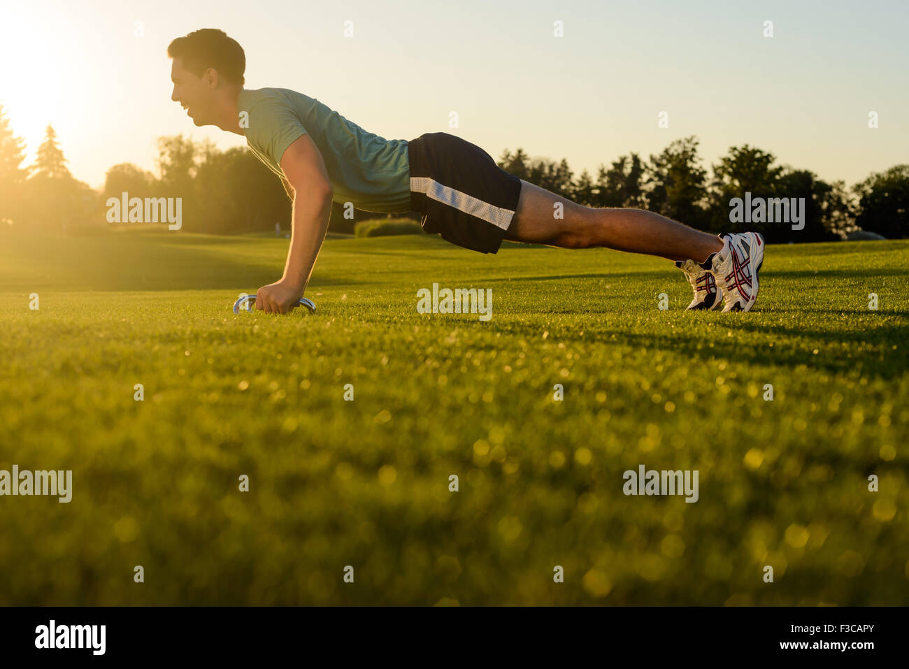 Young man engaged in sports in the street Stock Photo - Alamy