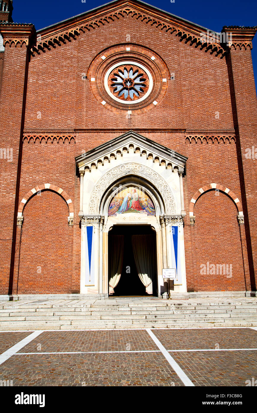 lombardy in the castellanza old church closed brick tower sidewalk ...