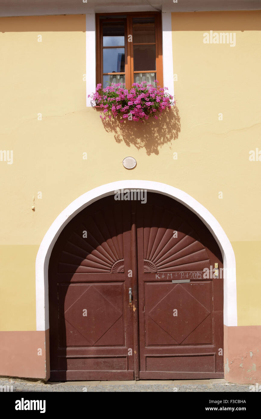 frontage of old house with gate and window Stock Photo - Alamy