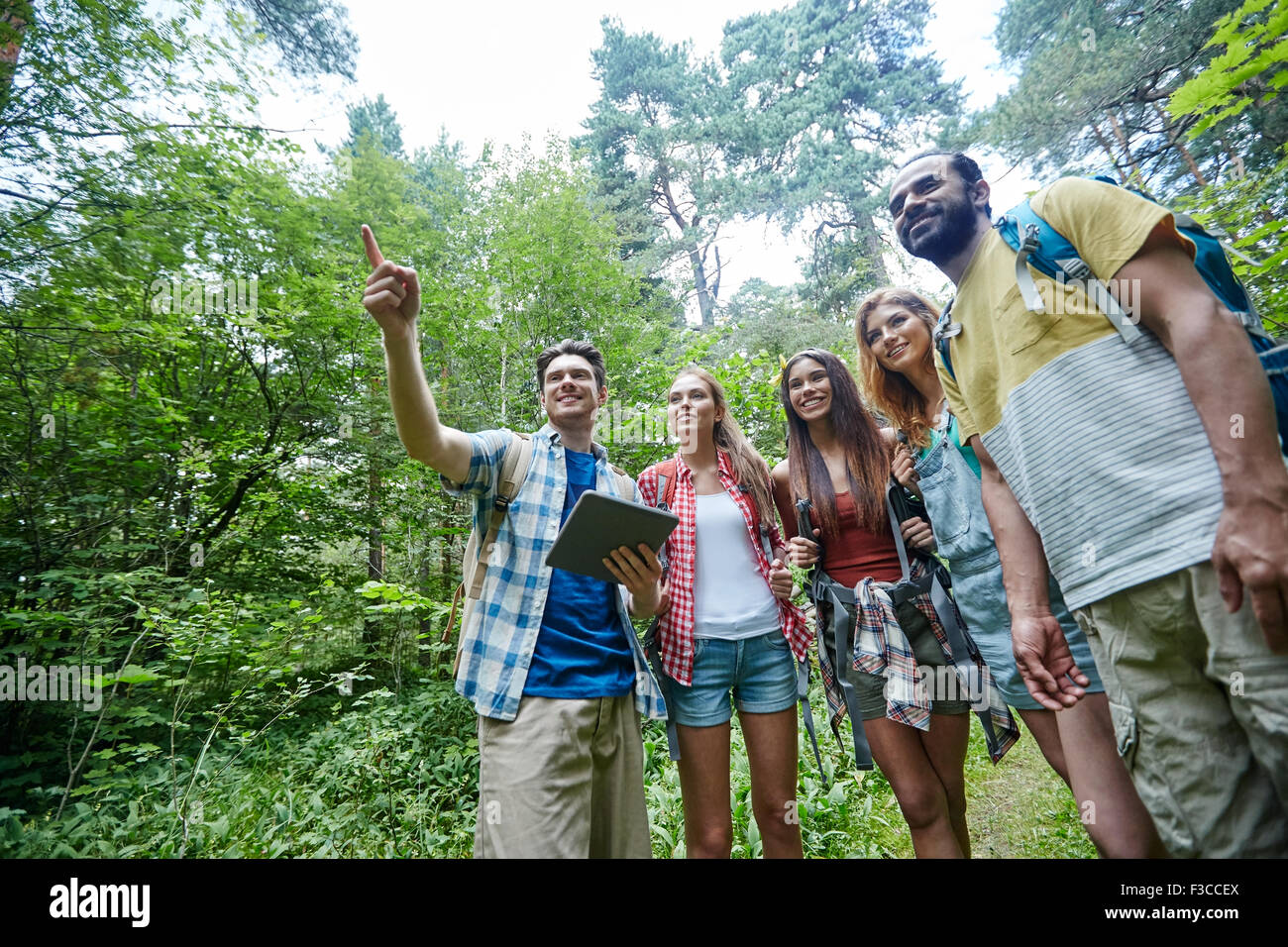 Happy teenager tablet computer hi-res stock photography and images - Alamy