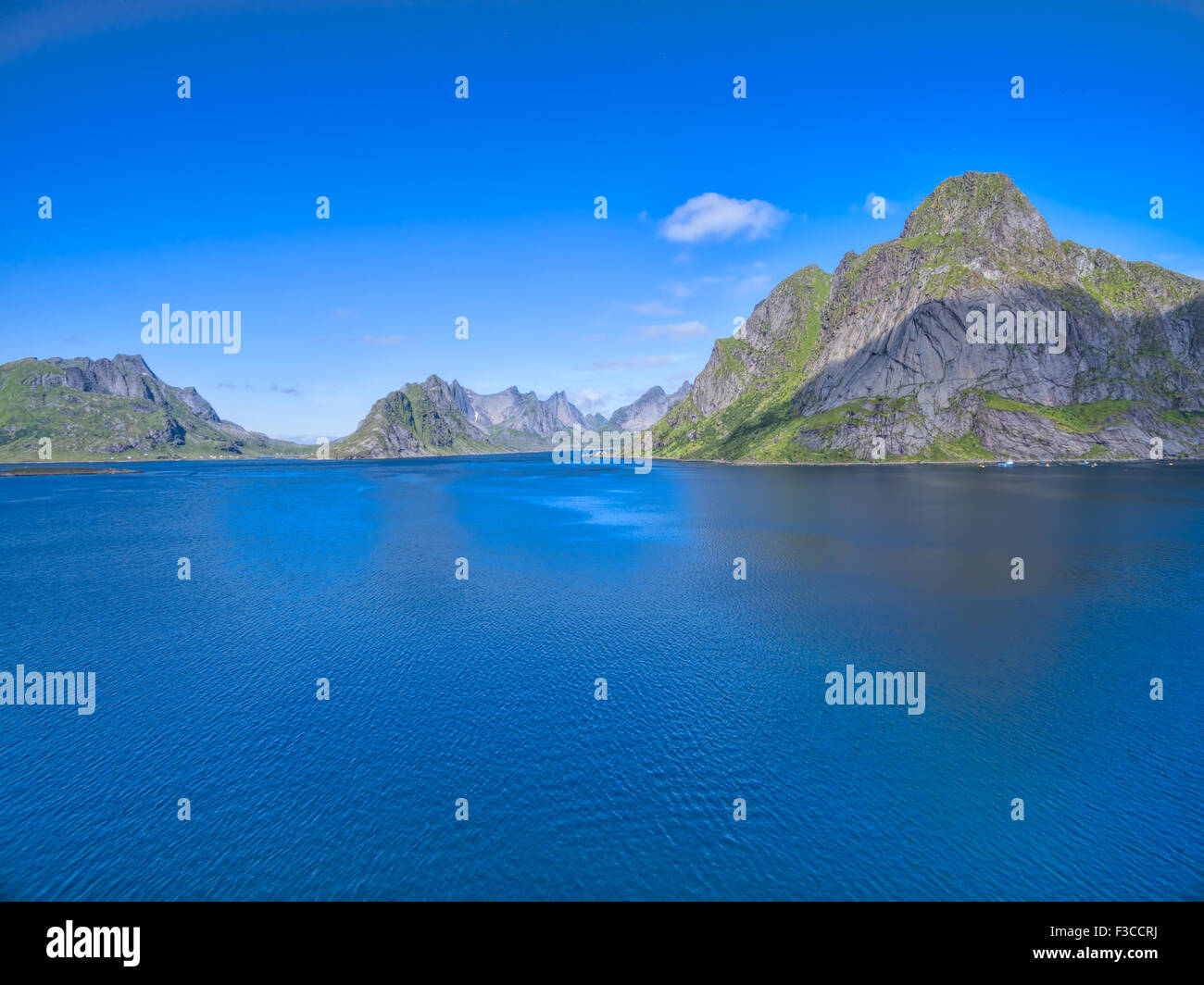 Scenic low aerial view of fjord on Lofoten islands surrounded by ...