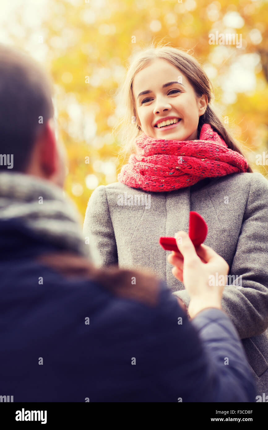 close up of couple with engagement ring in box Stock Photo - Alamy