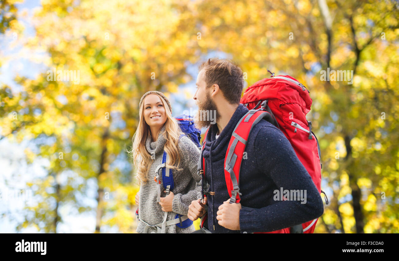 Happy tourist couple backpacks hi-res stock photography and images - Alamy