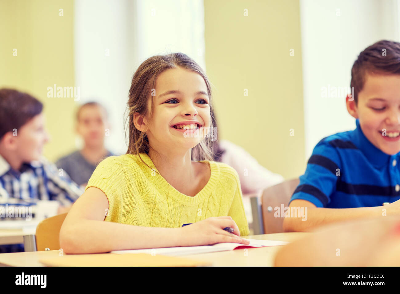 Happy kids at elementary school hi-res stock photography and images - Alamy