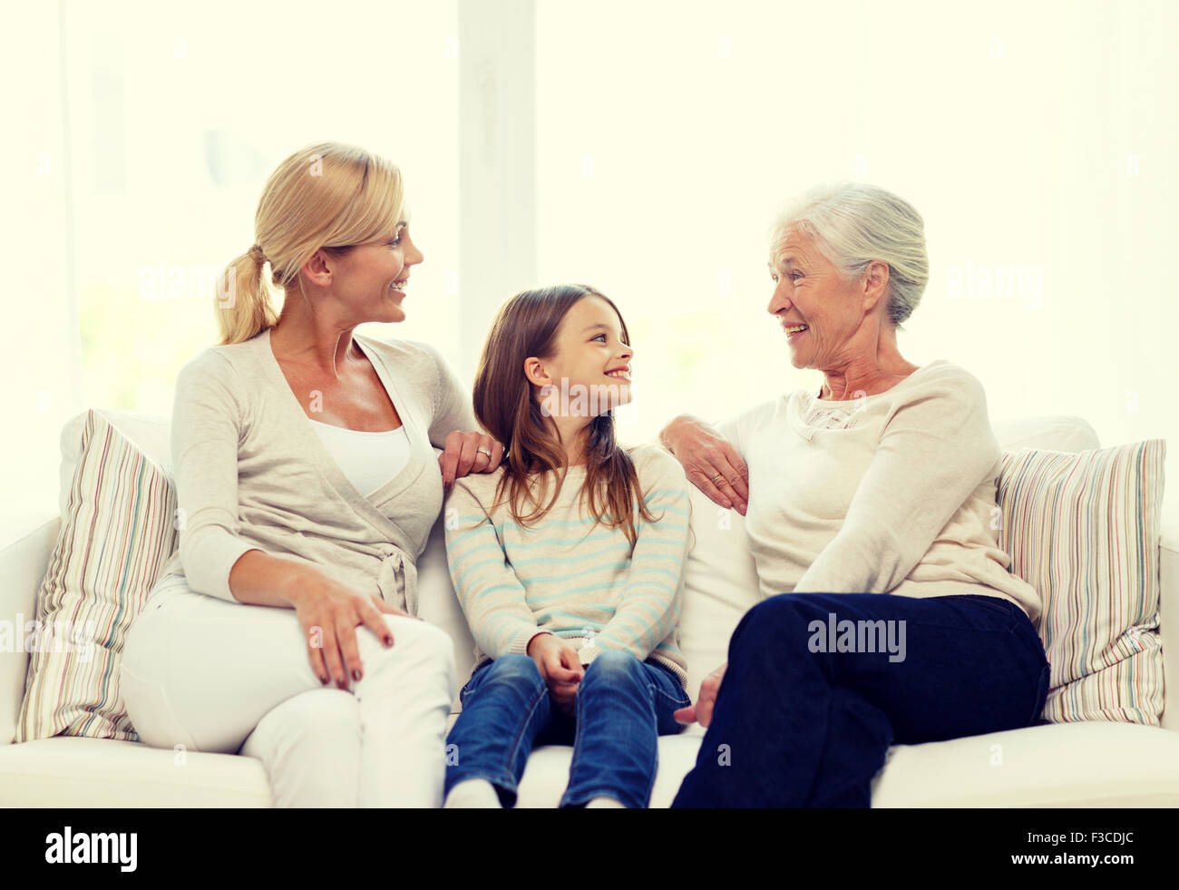 smiling family at home Stock Photo - Alamy