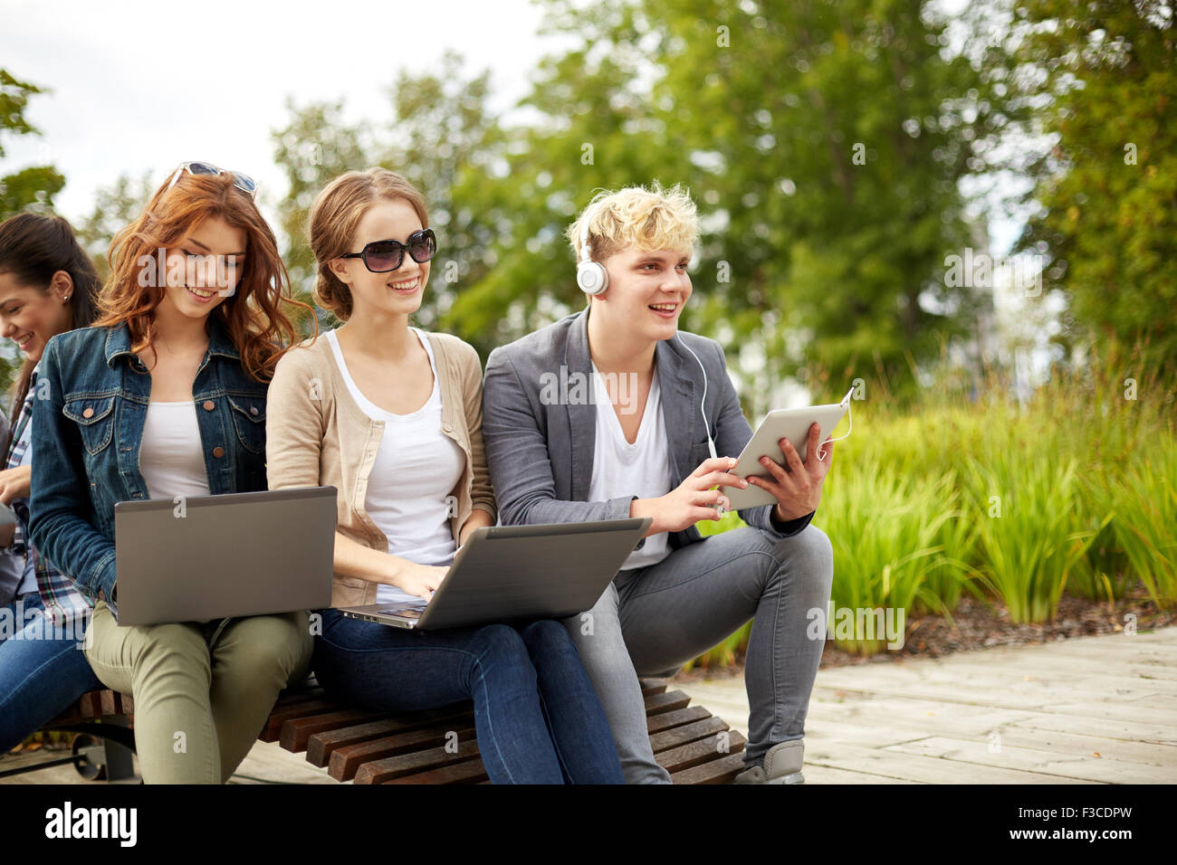 students or teenagers with laptop computers Stock Photo - Alamy