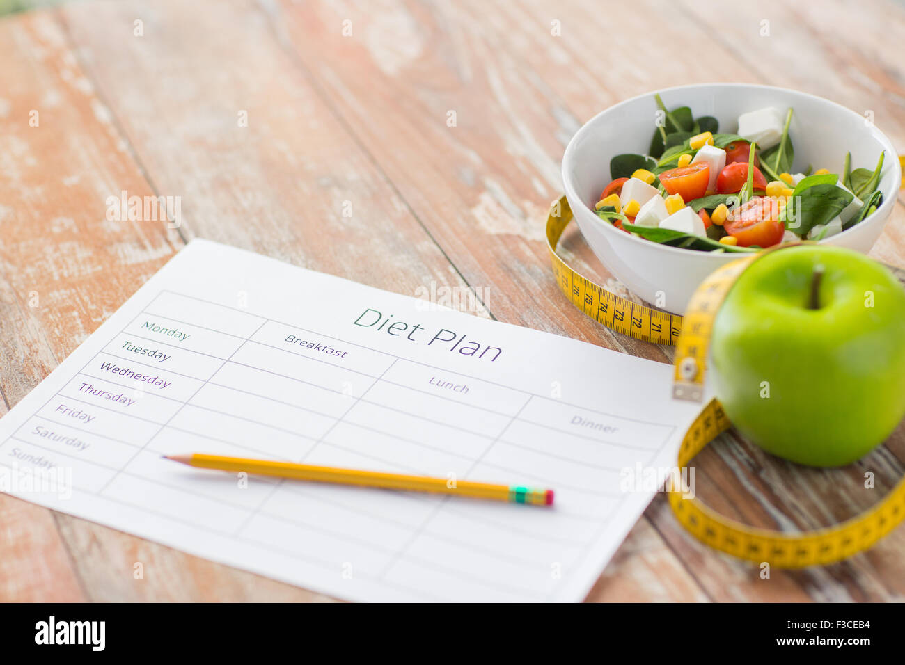 close up of diet plan and food on table Stock Photo - Alamy