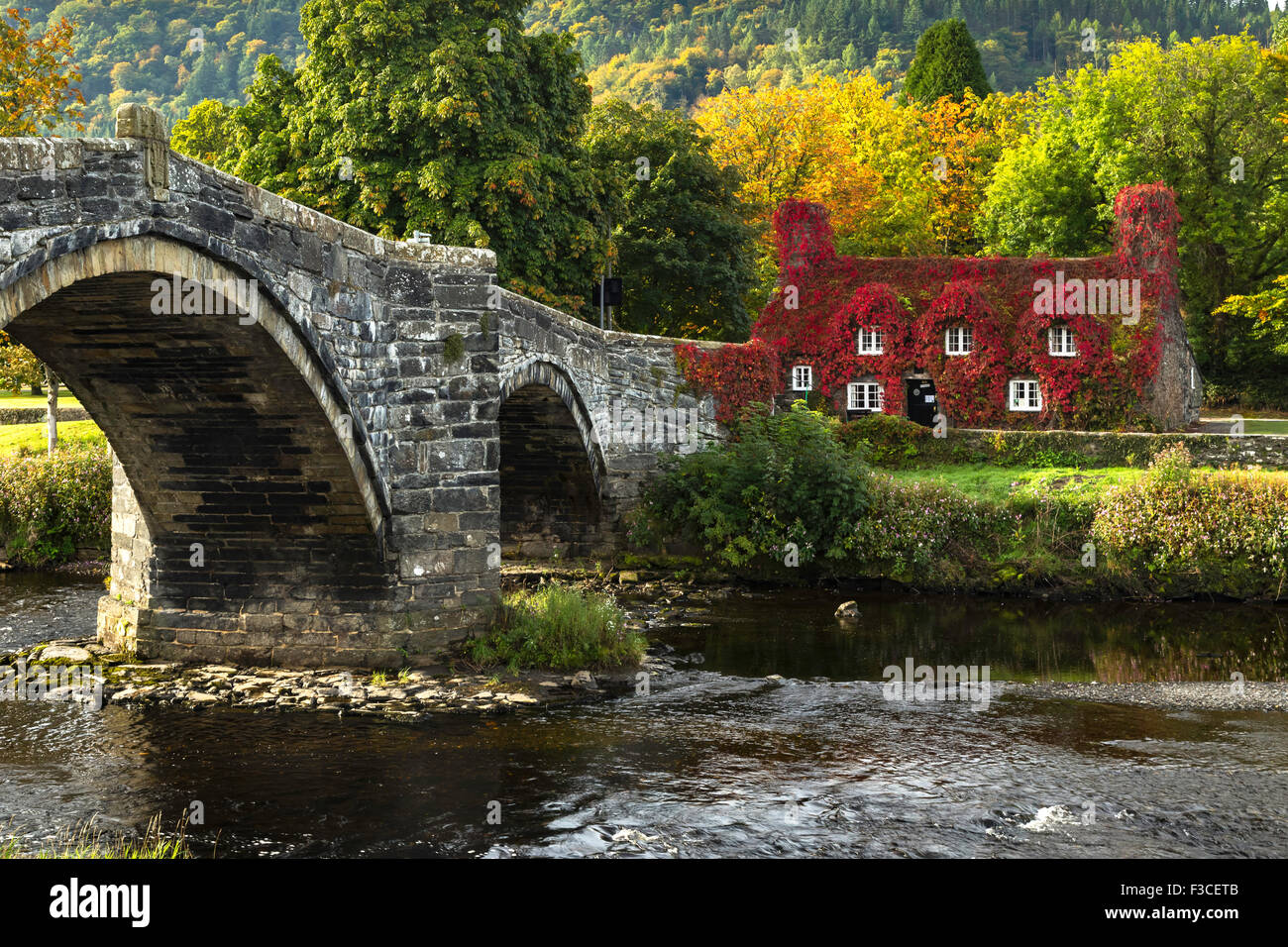 Tu Hwnt I'r Bont and Stone Road Bridge over Afon Conwy Stock Photo - Alamy