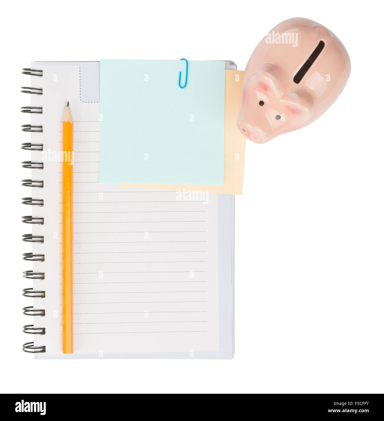 Copybook with piggy bank, top view Stock Photo - Alamy