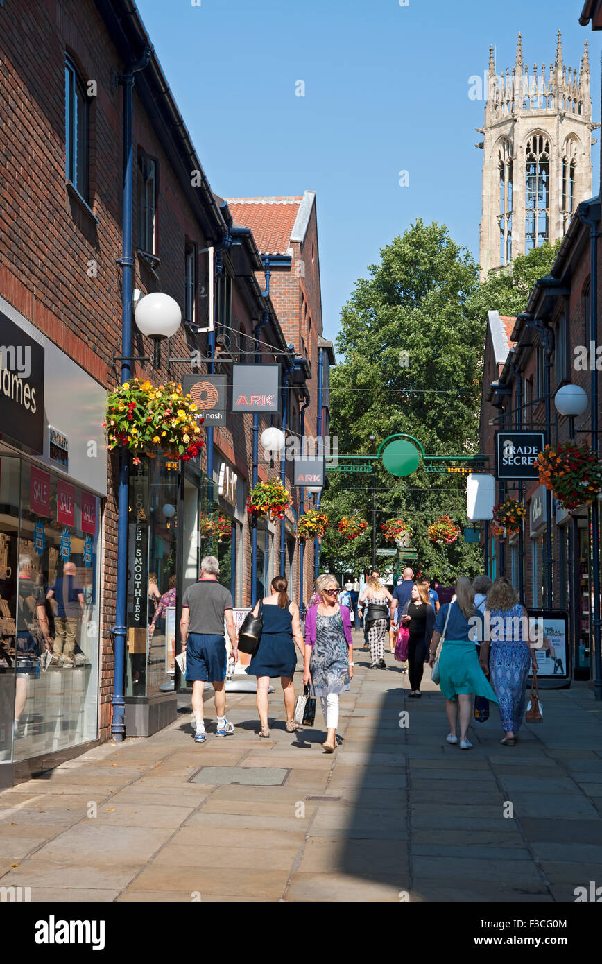 People visitors tourists walking along Coppergate shopping centre in ...