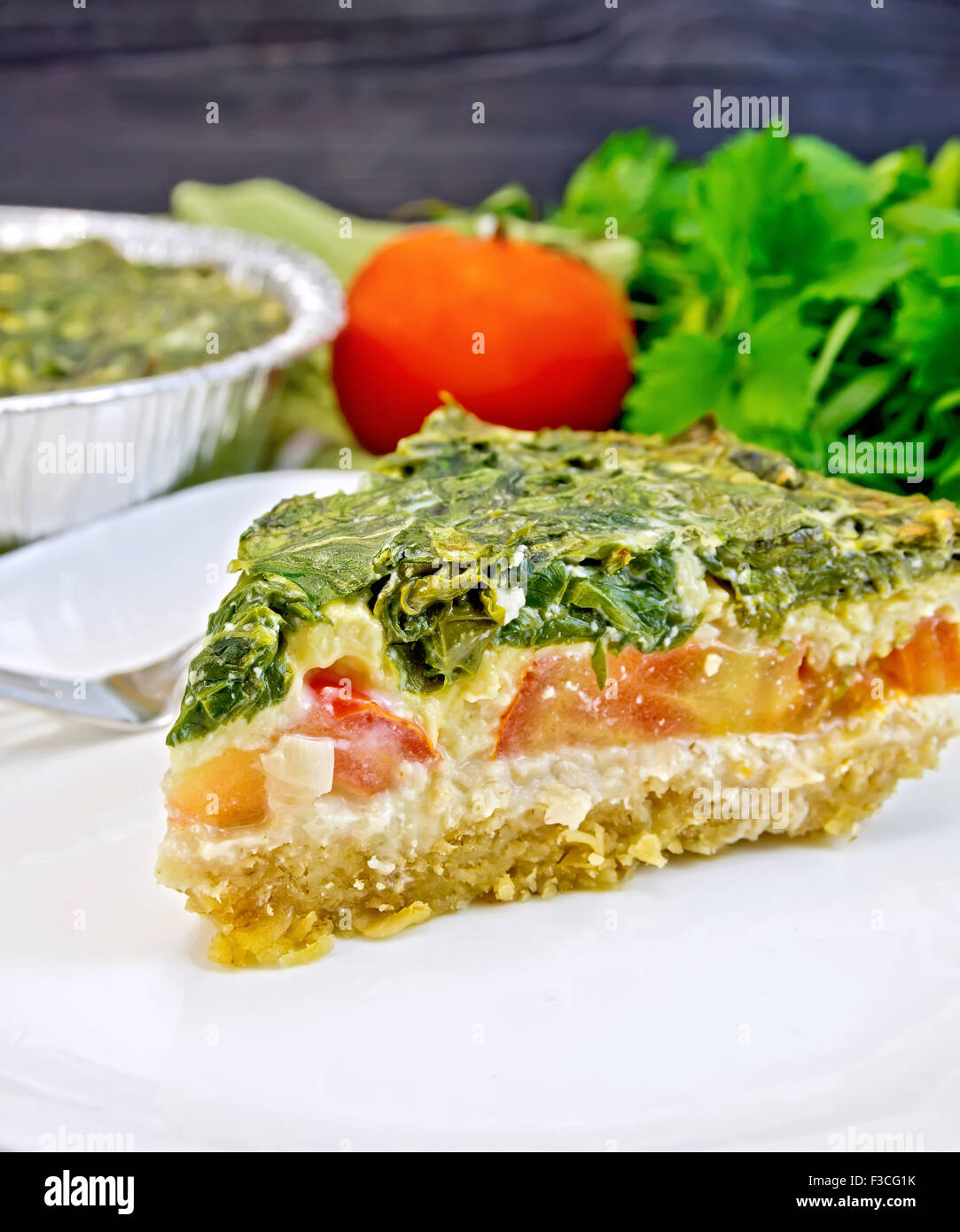 Pie celtic with spinach on board Stock Photo - Alamy