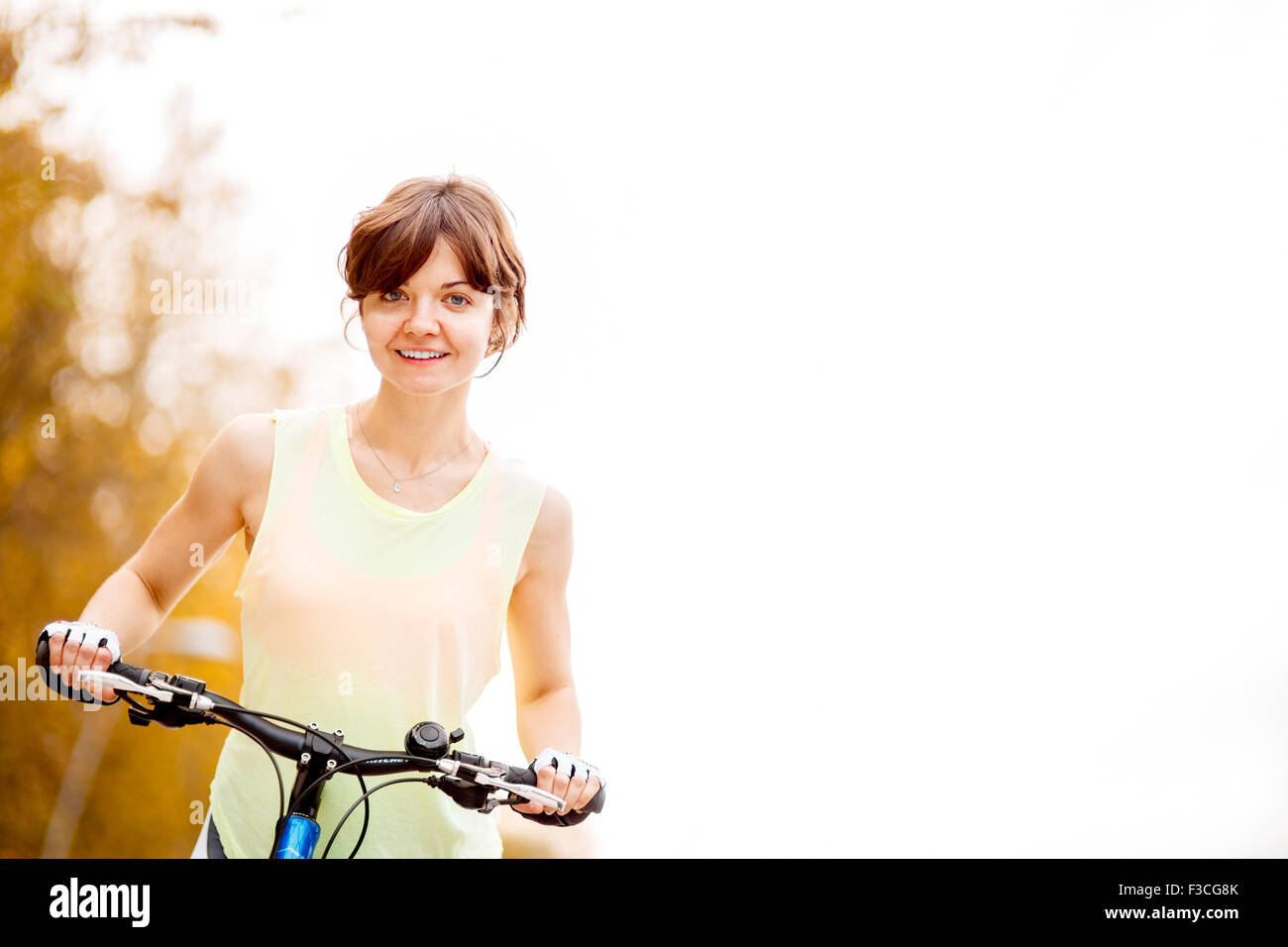 woman riding bicycle Stock Photo - Alamy