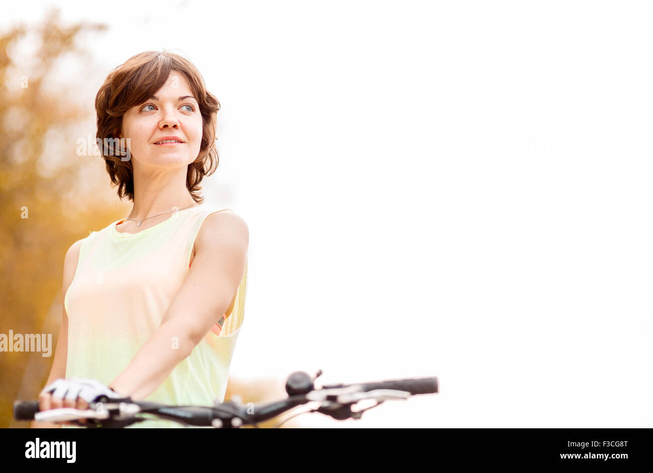woman riding bicycle Stock Photo - Alamy