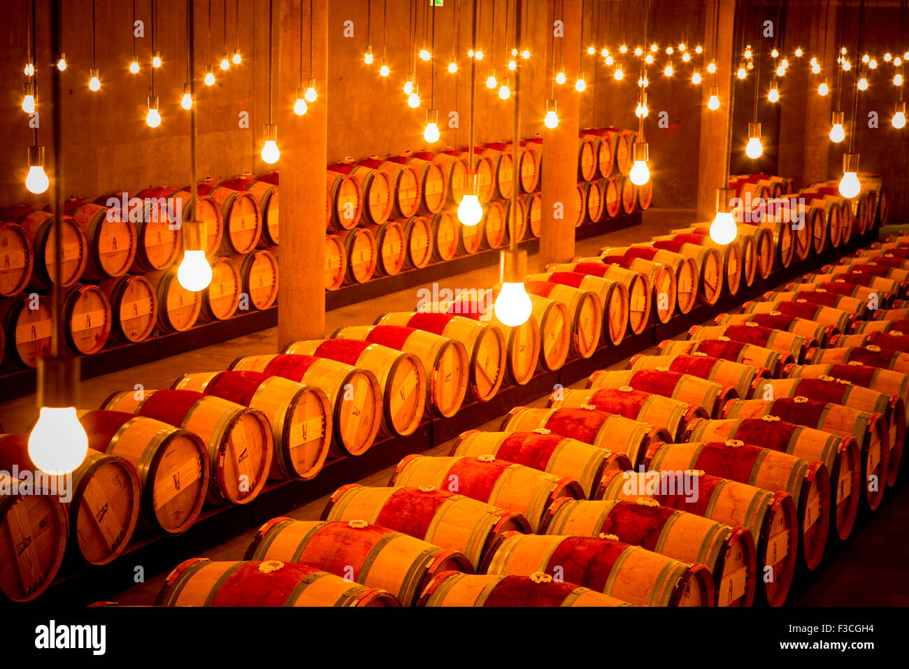 Wine casks in wine cellar Stock Photo - Alamy