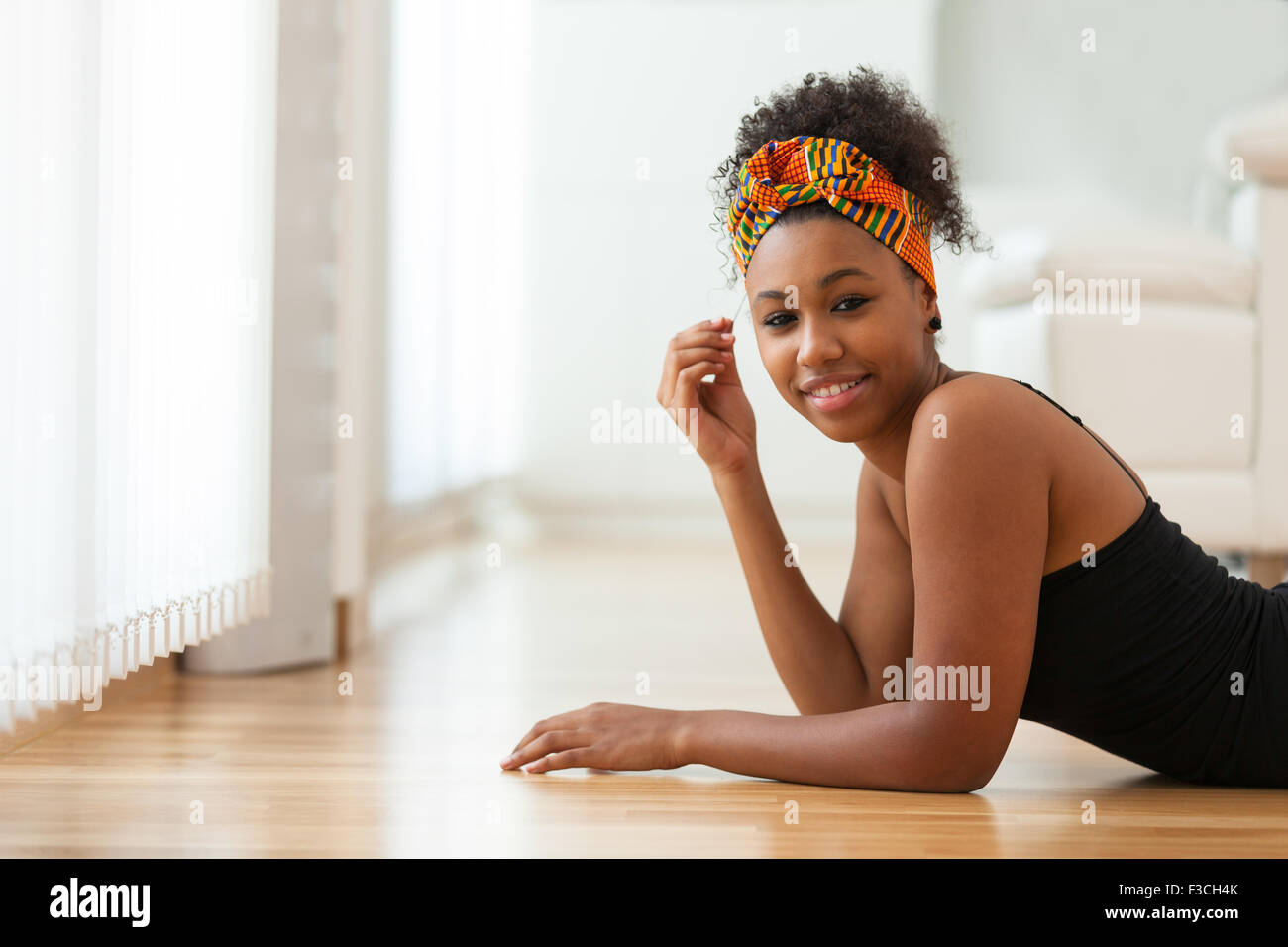 Beautiful African American Woman Wearing An African Head Scarf Black
