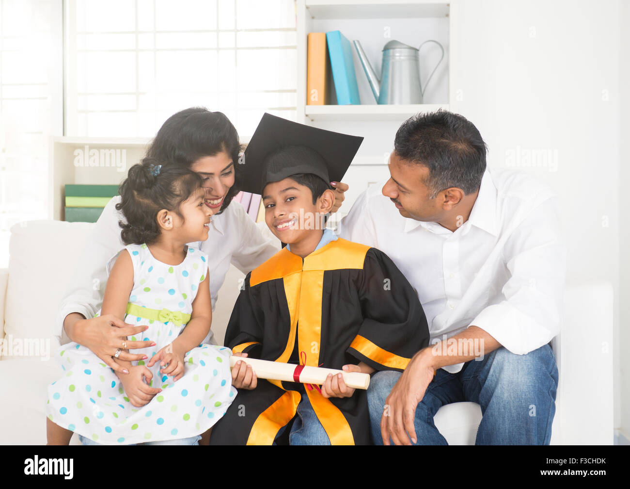 Happy indian family graduation, education concept photo Stock Photo - Alamy