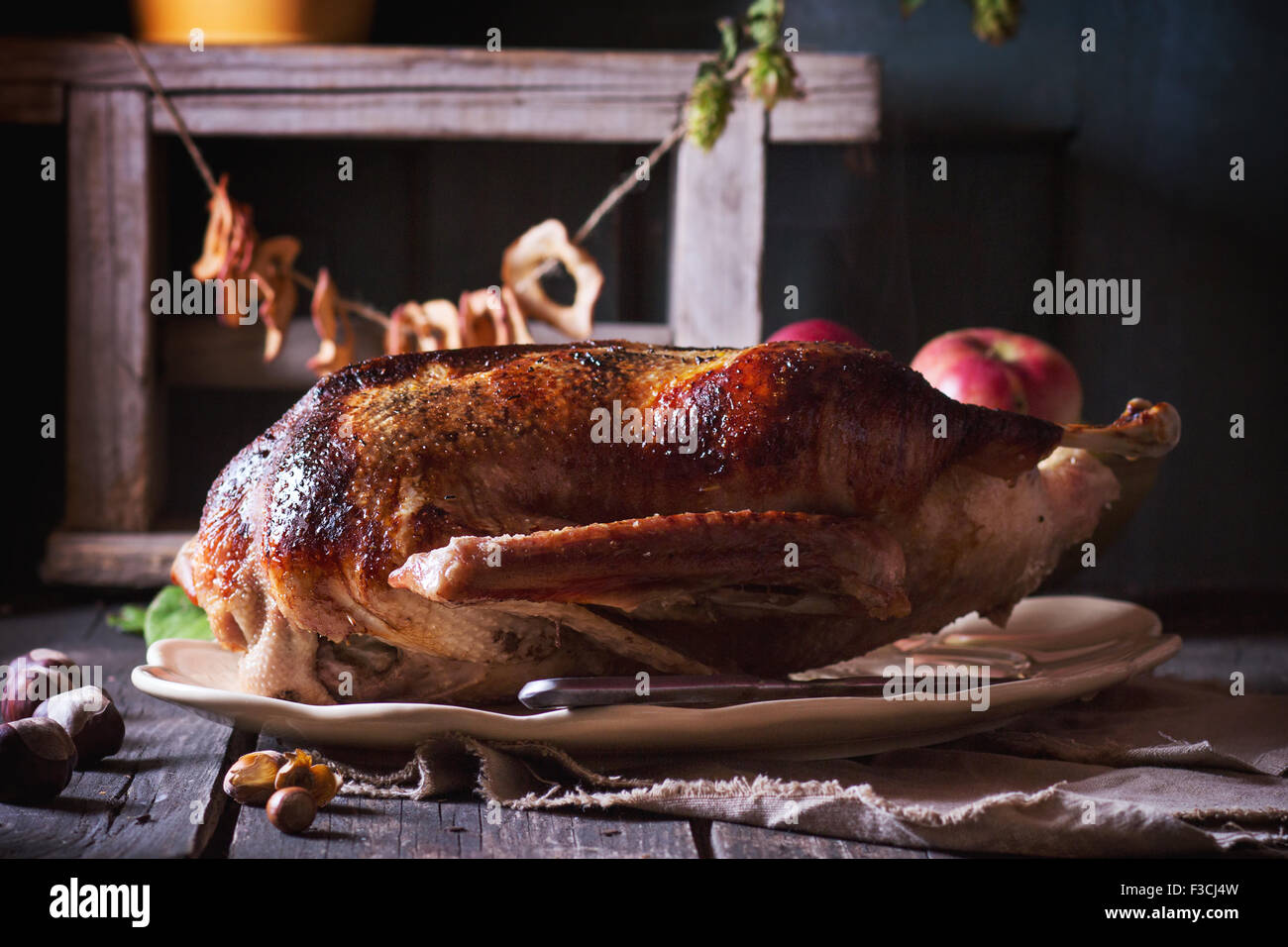 Roast goose with apples Stock Photo - Alamy