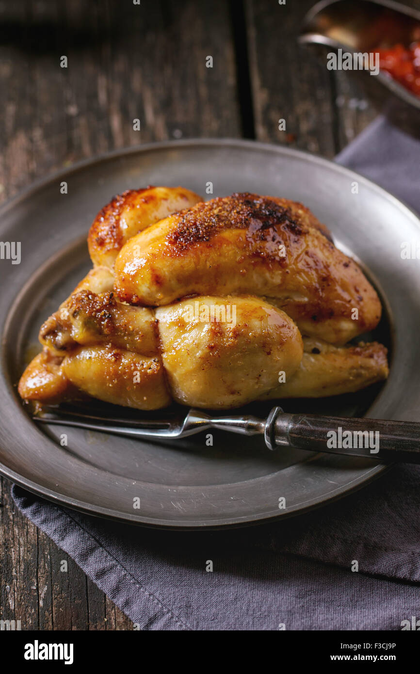Whole Grilled mini chicken Stock Photo - Alamy