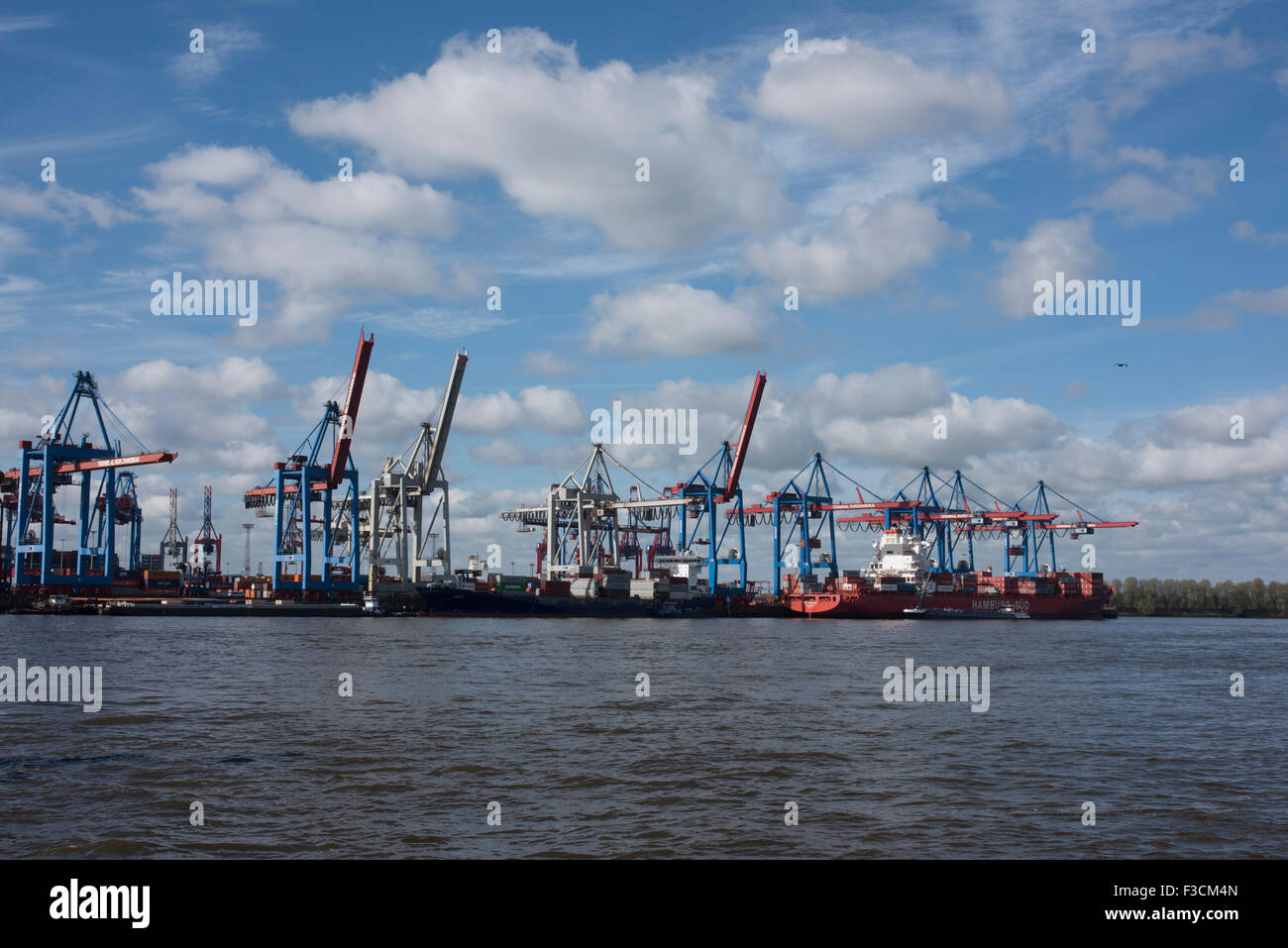 The Port of Hamburg showing docks and cranes used for loading and ...