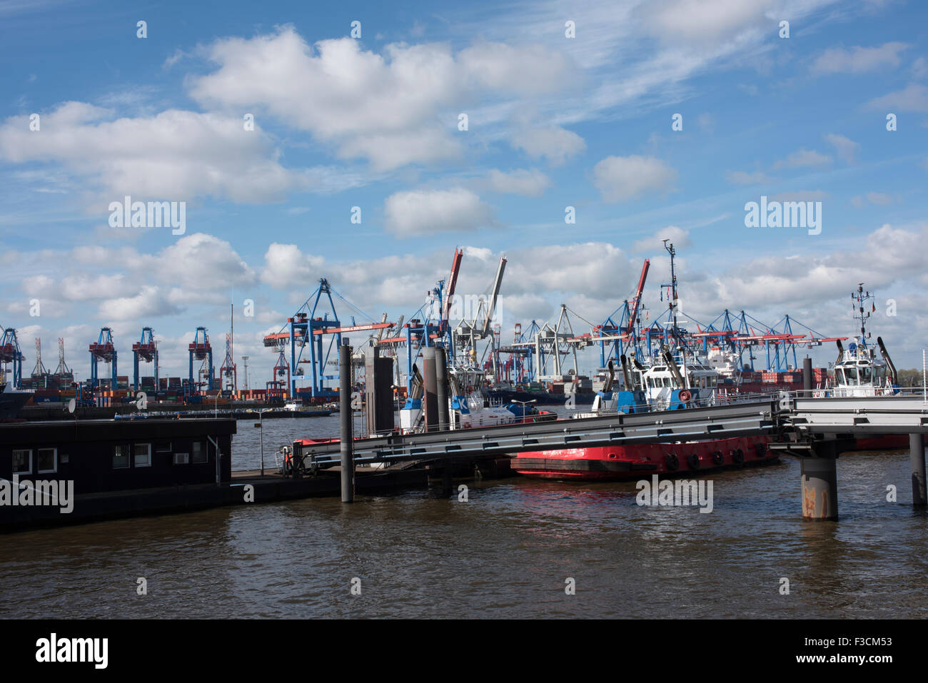 The Port of Hamburg showing docks and cranes used for loading and ...