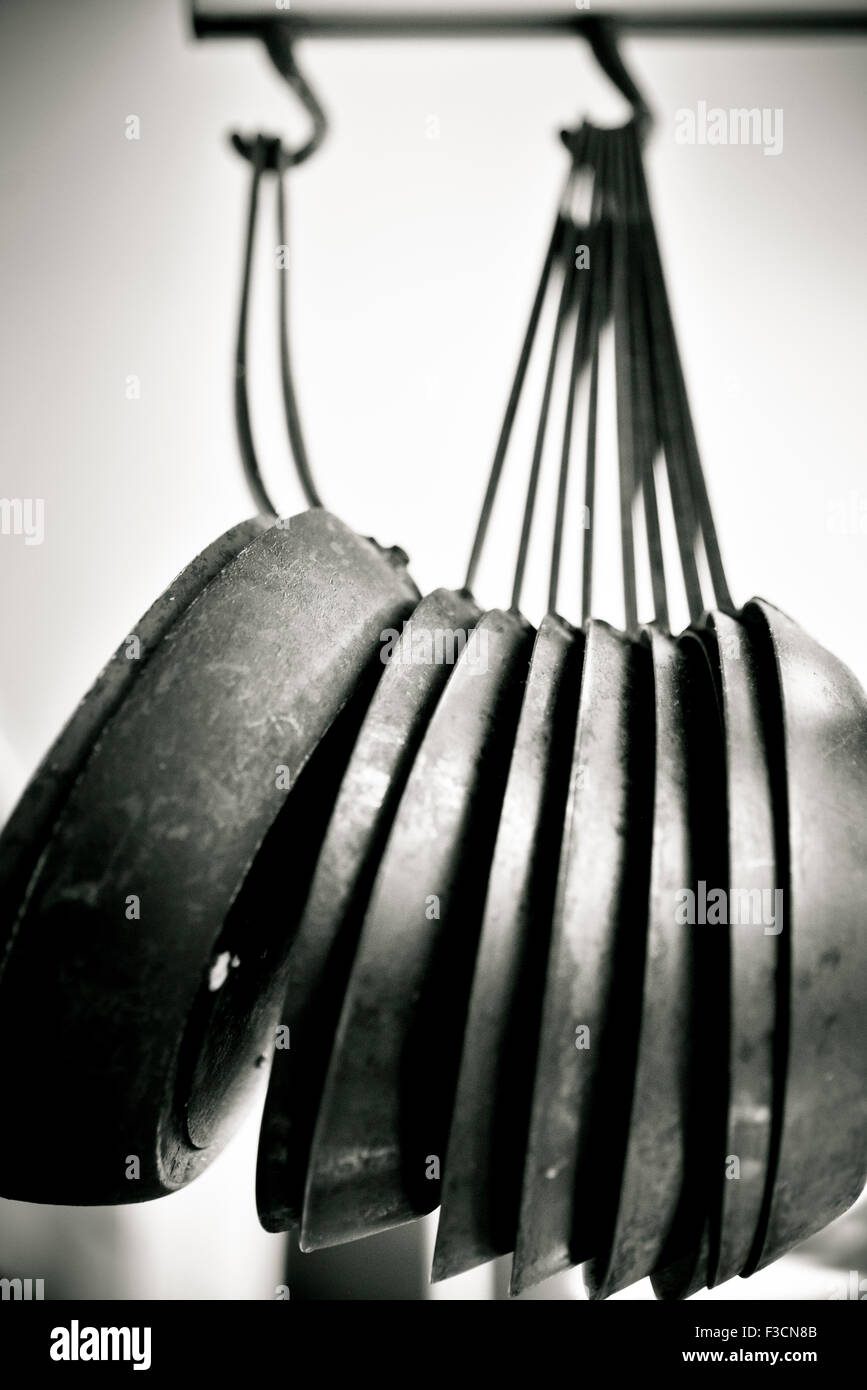 Hanging pans in kitchen hi-res stock photography and images - Alamy