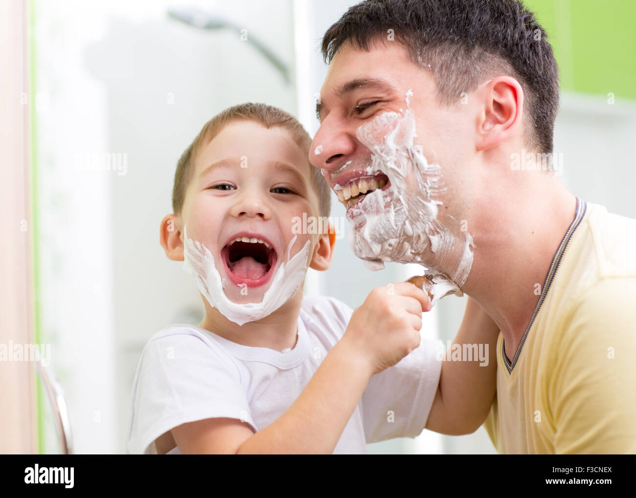 Father baby bathing hi-res stock photography and images - Alamy