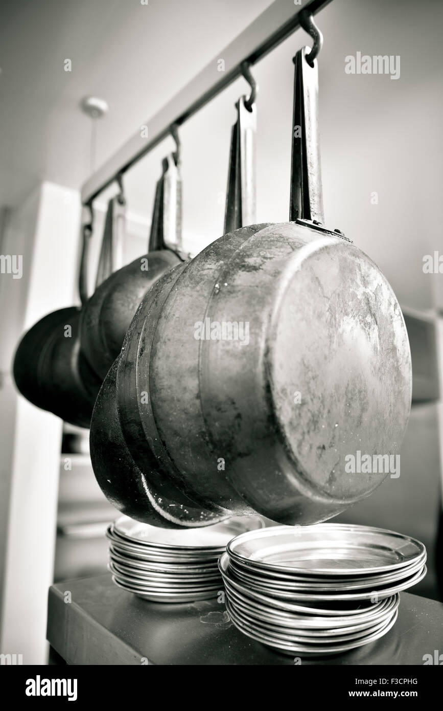 Hanging pans in kitchen hi-res stock photography and images - Alamy