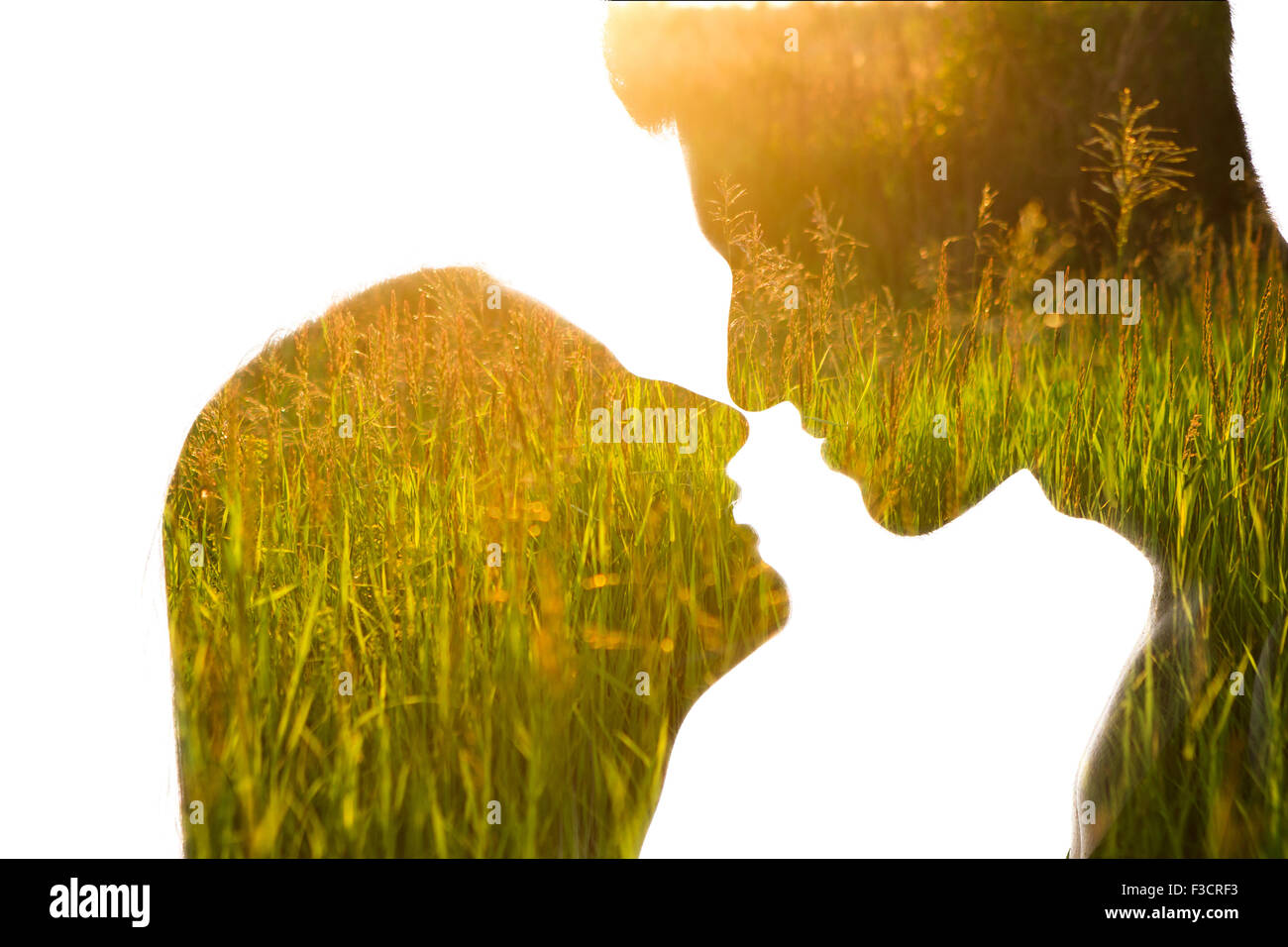 Double exposure portrait of kissing couple Stock Photo - Alamy