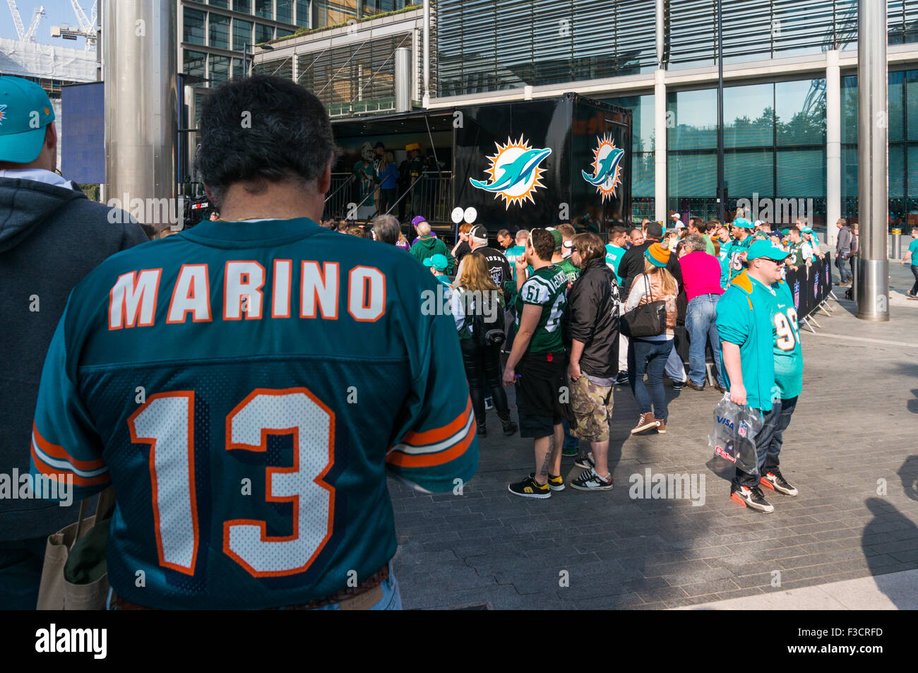 A Miami Dolphins fan wearing Dan Marinos number 13 game shirt outside ...