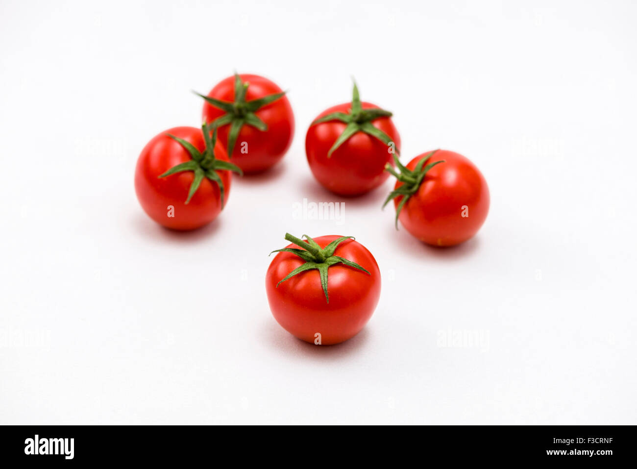 Five red tomatoes hi-res stock photography and images - Alamy
