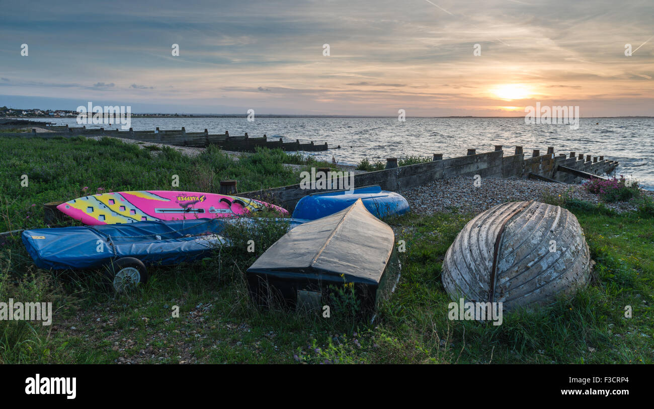 Four boats and a windsurfing boars, Whitstable, Kent Stock Photo - Alamy