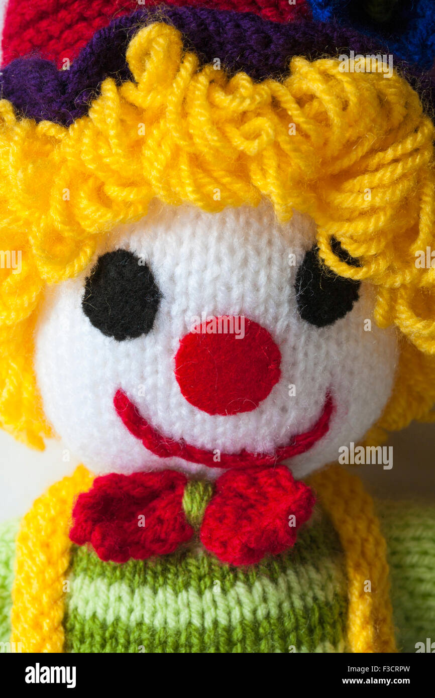 hand knitted clown showing face detail Stock Photo - Alamy