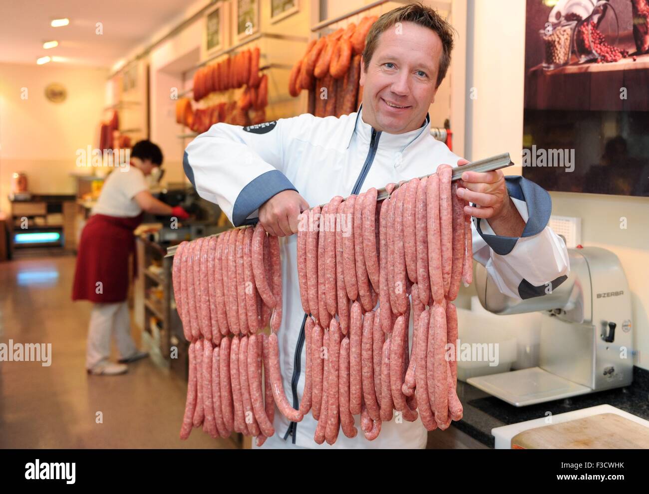 HANDOUT - A handout shows master butcher Dirk Ludwig with Bratwurst ...