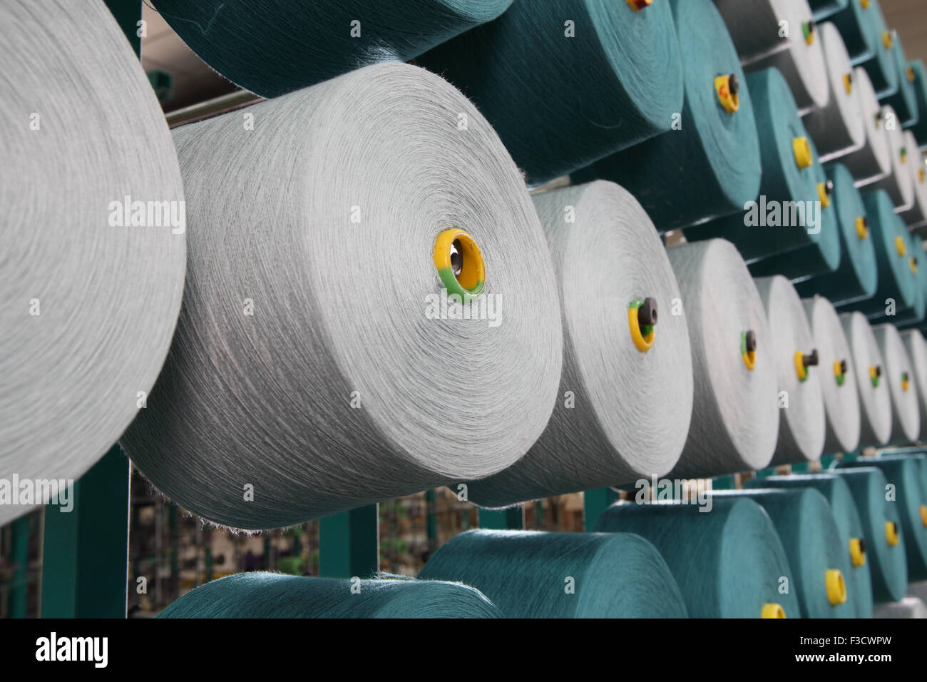 thread spool in a factory Stock Photo - Alamy
