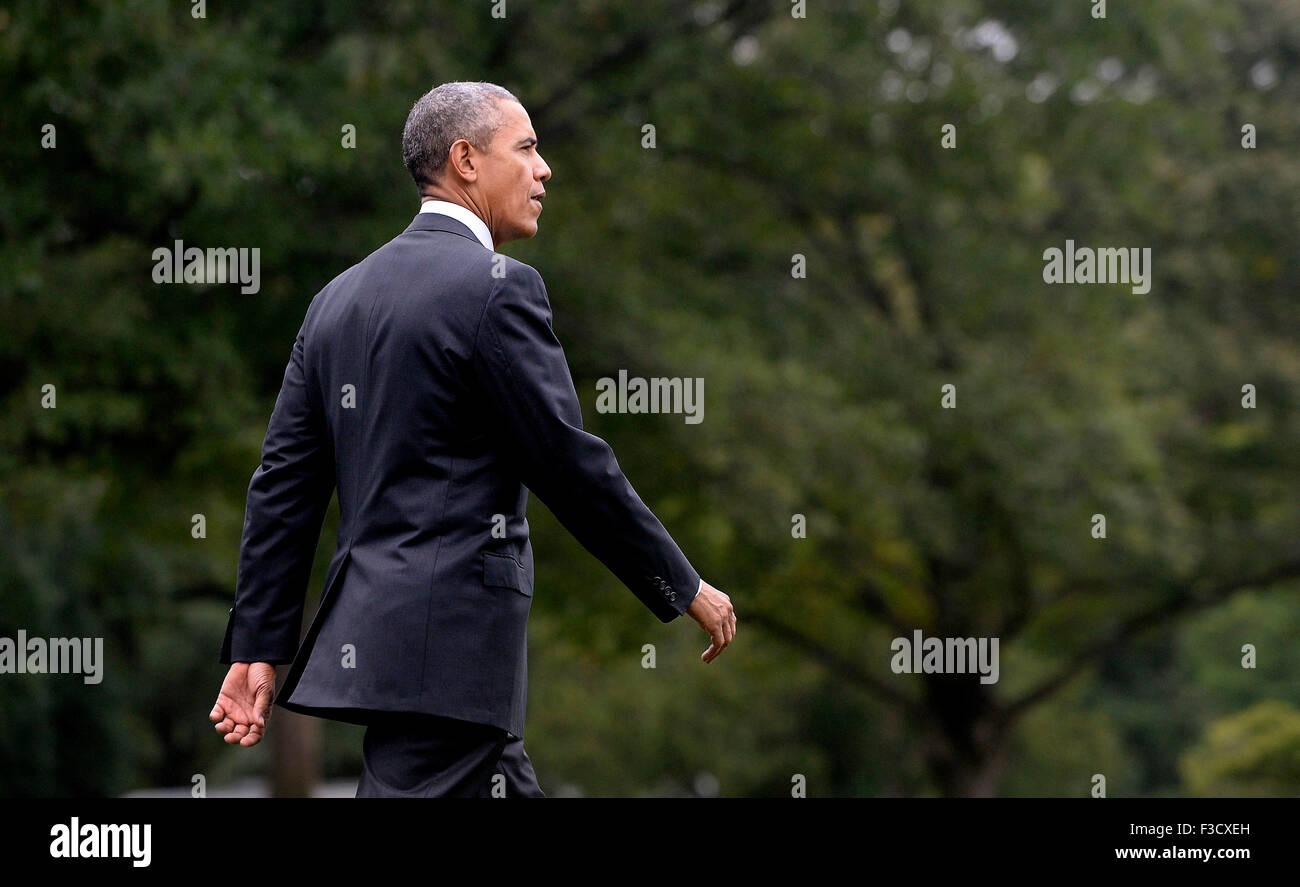 United States President Barack Obama walks on the South Lawn towards ...