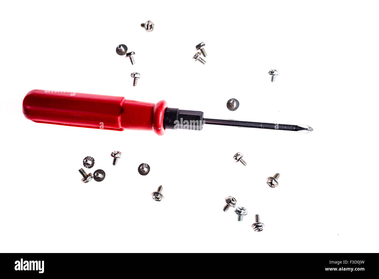 isolated shot of red handle screwdriver and screws Stock Photo - Alamy