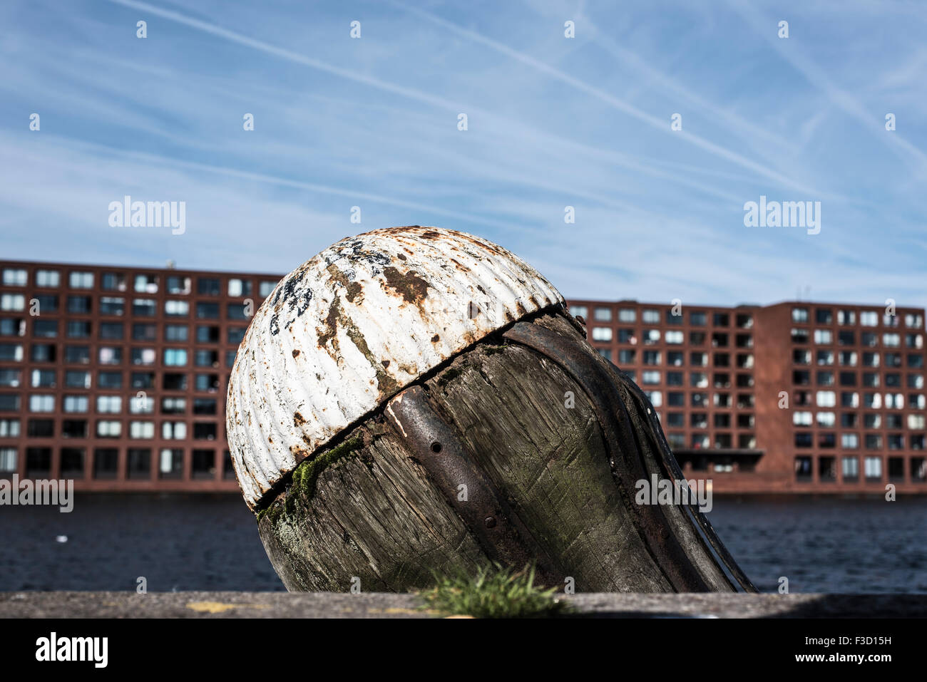 Broken boulder in Amsterdam Harbor, with Java Eiland in the background ...