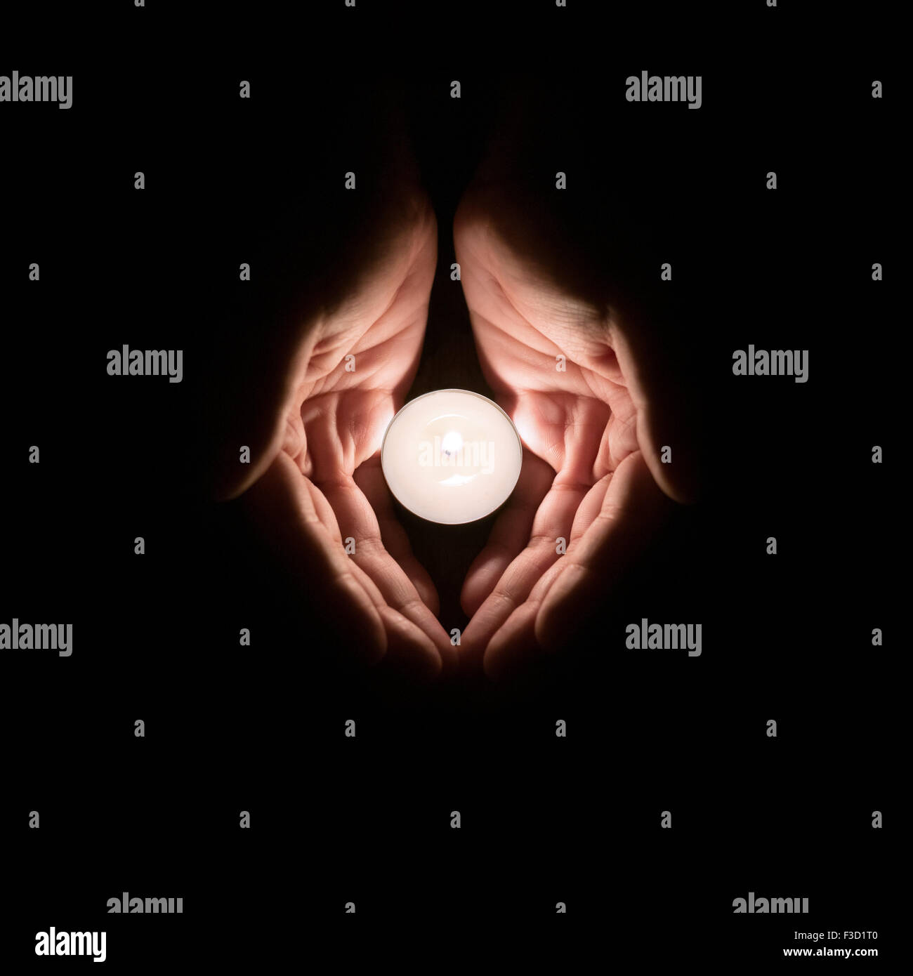 hand with candle Stock Photo - Alamy