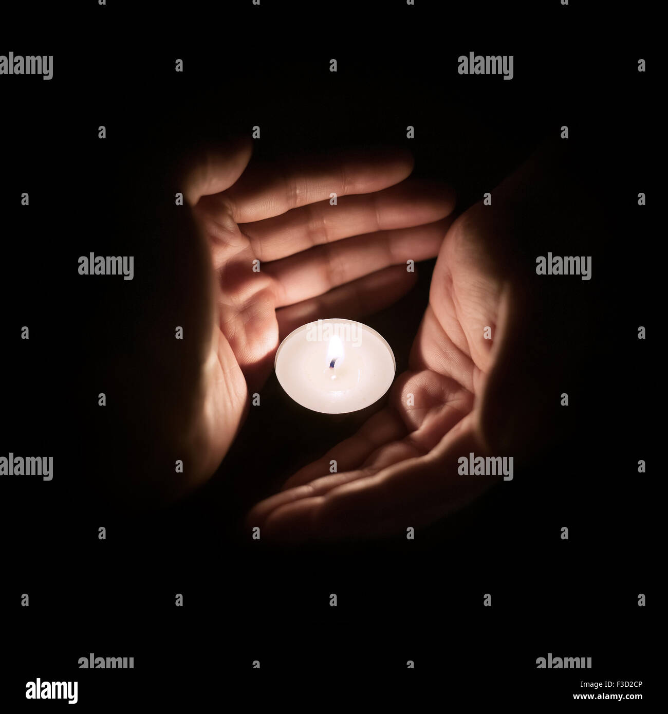 hand with candle Stock Photo - Alamy