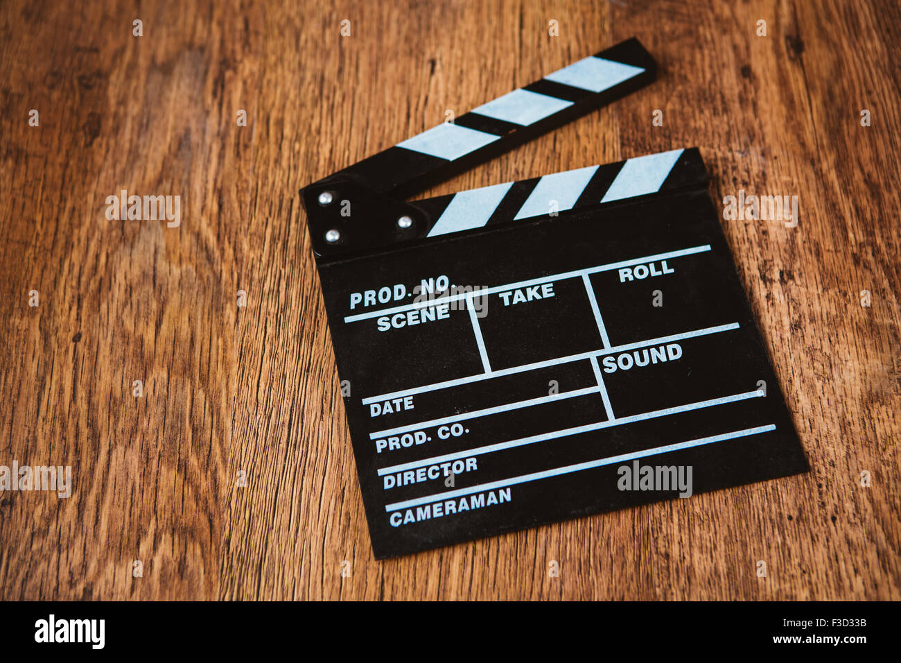 Movie clapper on wooden background Stock Photo - Alamy
