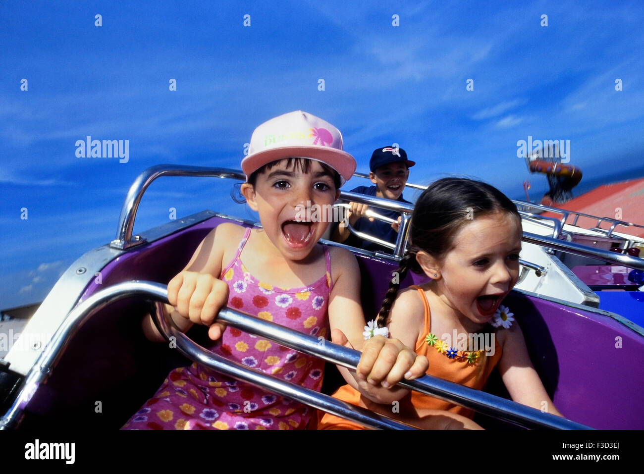 Kids on a fairground ride at Mablethorpe. Lincolnshire. England. UK ...