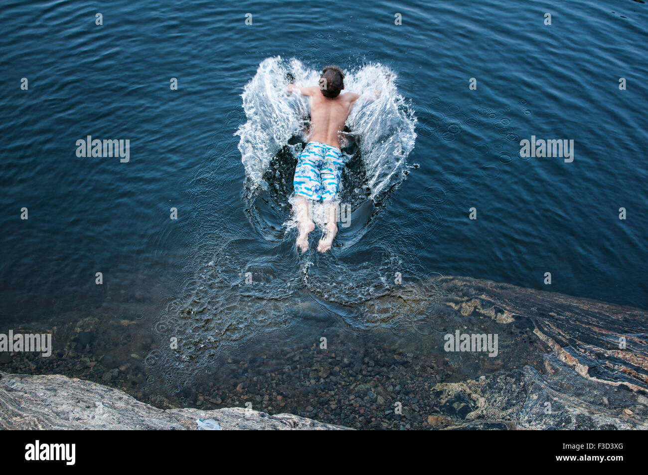 Boy and splash hi-res stock photography and images - Alamy