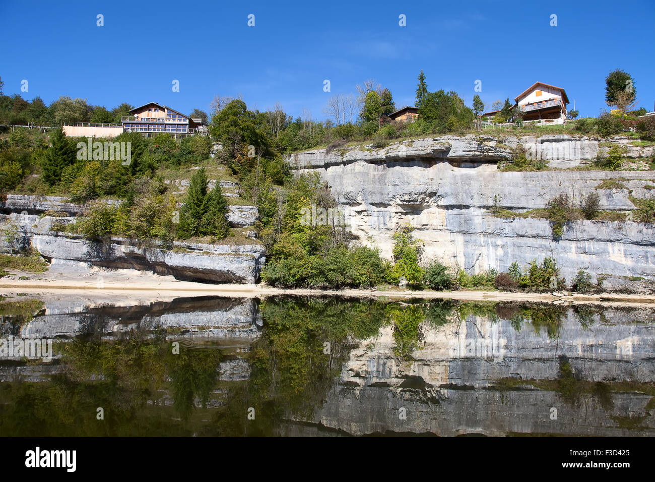 Natural rock formation rural water source france hi-res stock ...