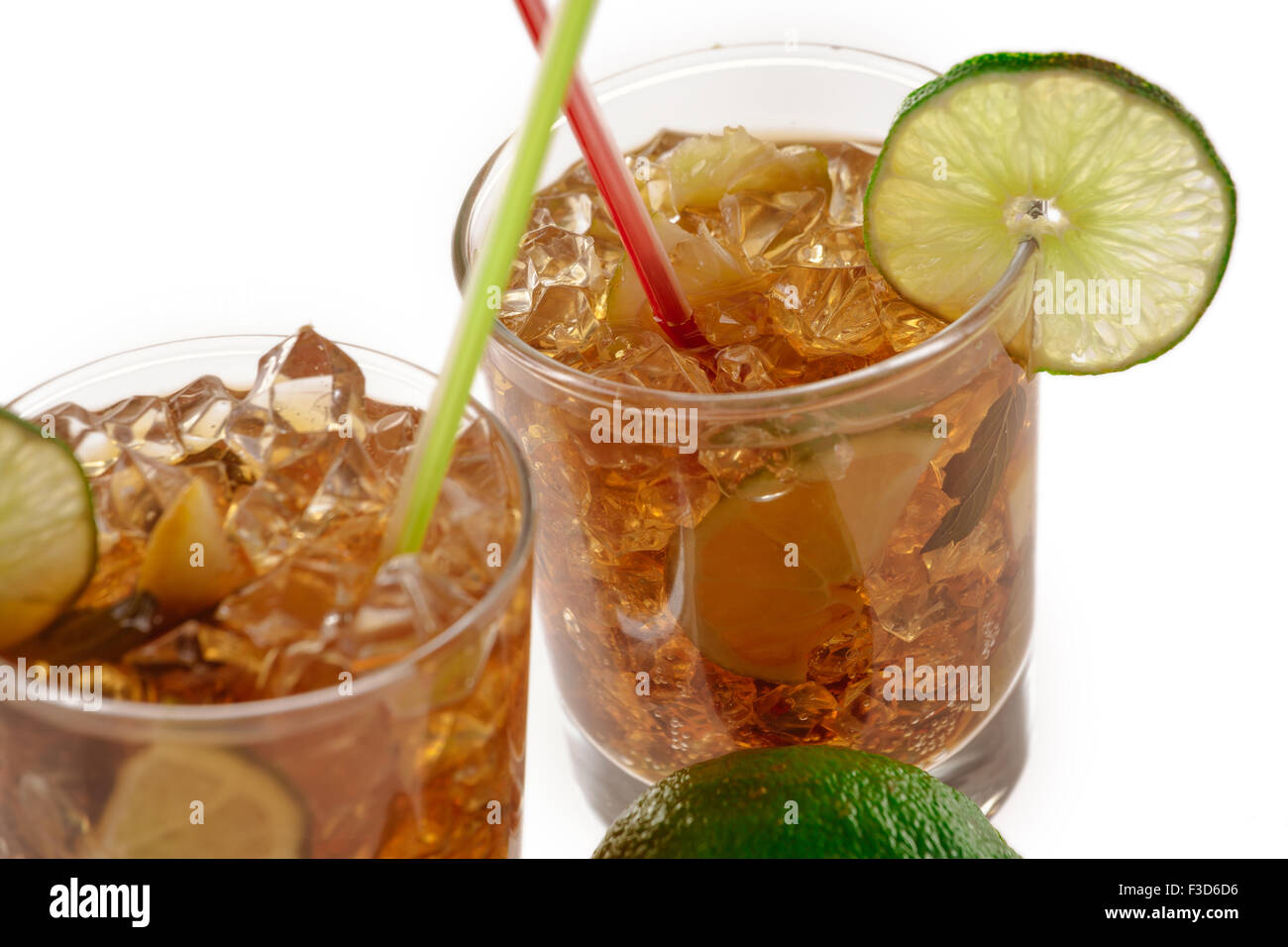Fresh Fresh cocktail with cola drink and lime fruit on white background ...