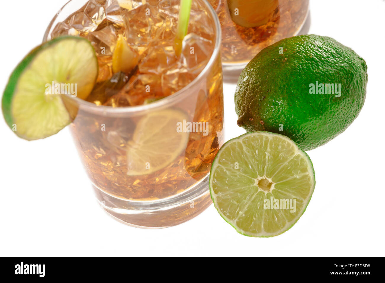 Fresh Fresh cocktail with cola drink and lime fruit on white background ...