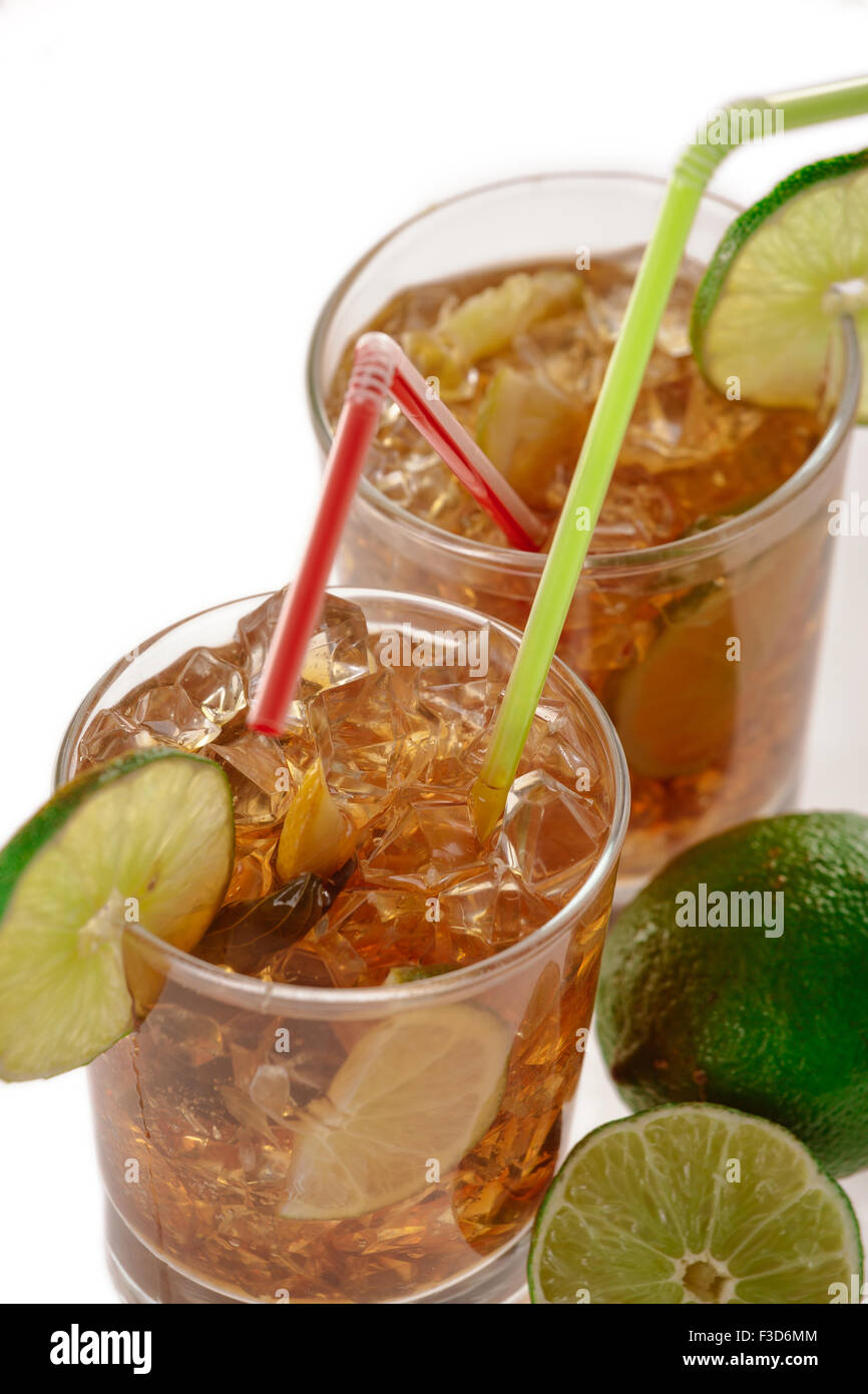 Fresh Fresh cocktail with cola drink and lime fruit on white background ...