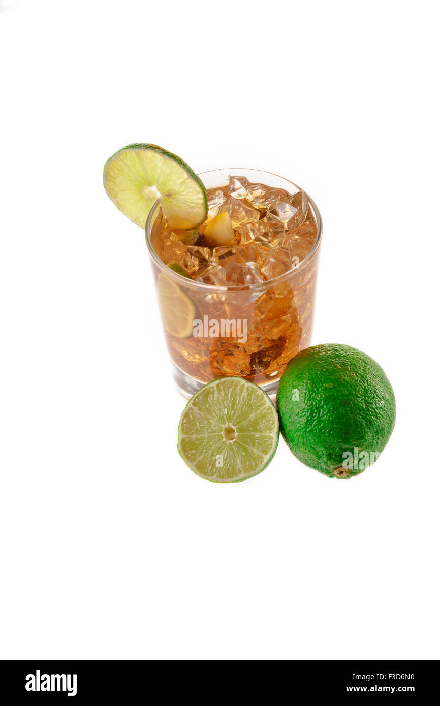 Fresh Fresh cocktail with cola drink and lime fruit on white background ...