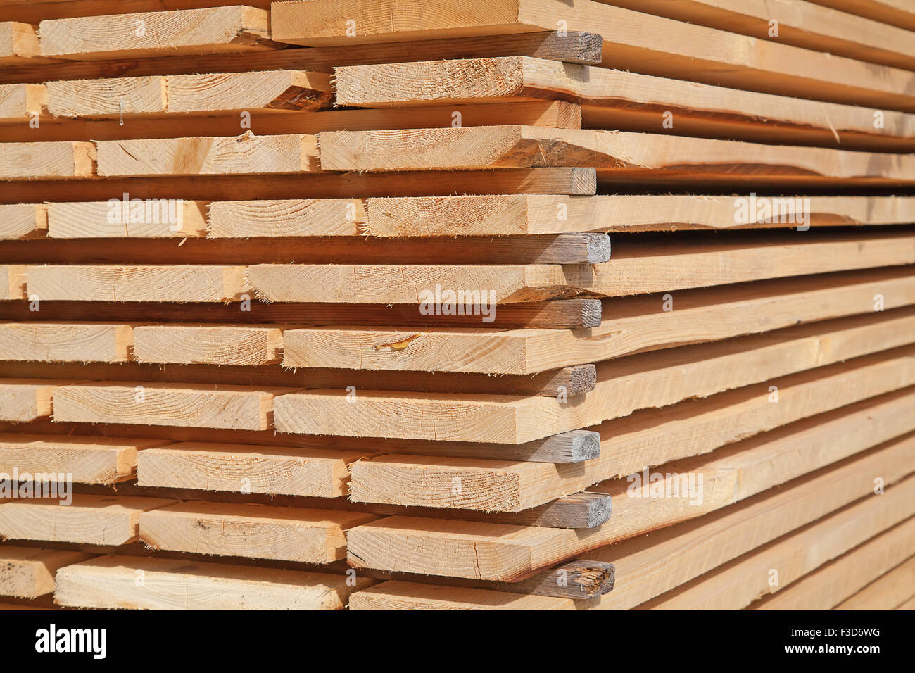 Stack of new wooden studs at the lumber yard Stock Photo - Alamy
